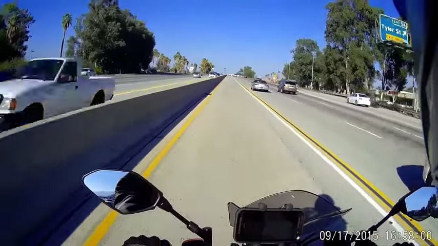 Motorcycle Rider Cut Off in Traffic by Car VIDEO | Cycle World