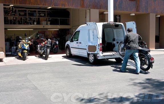 Transporting a motorcycle in the 2010 Ford Transit Connect Van | Cycle ...