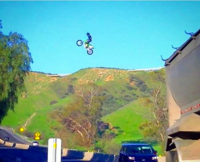 Watch This Guy Jump Over A Freeway On His Dirtbike | Cycle World